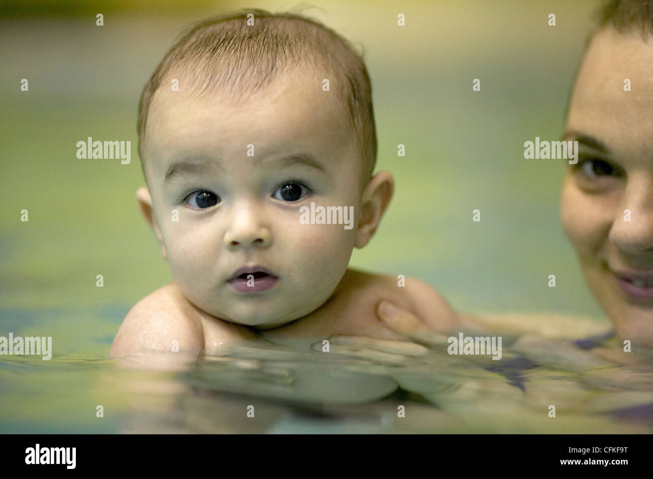 Baby in swimming pool hi-res stock photography and images - Alamy