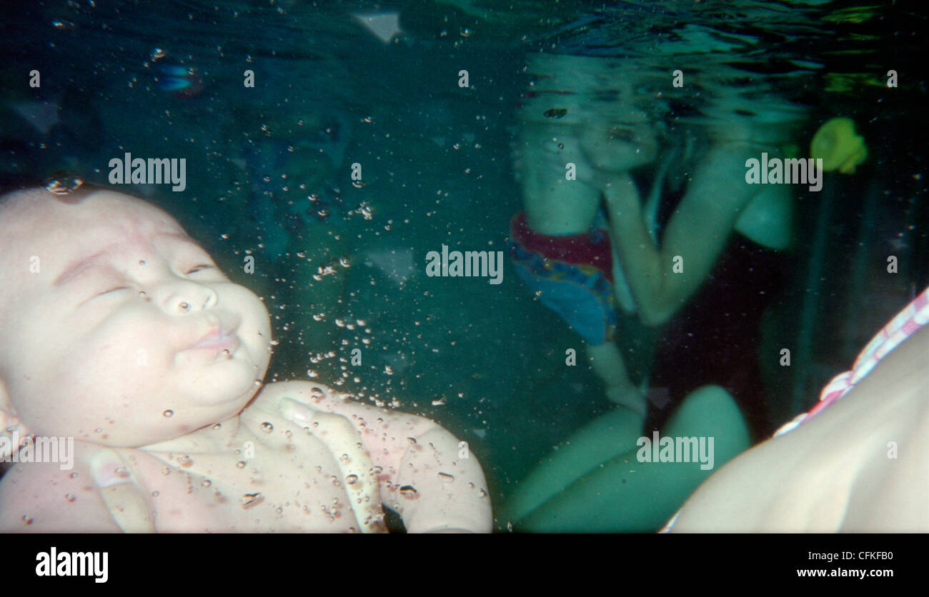 Baby being Dunked Underwater Stock Photo - Alamy