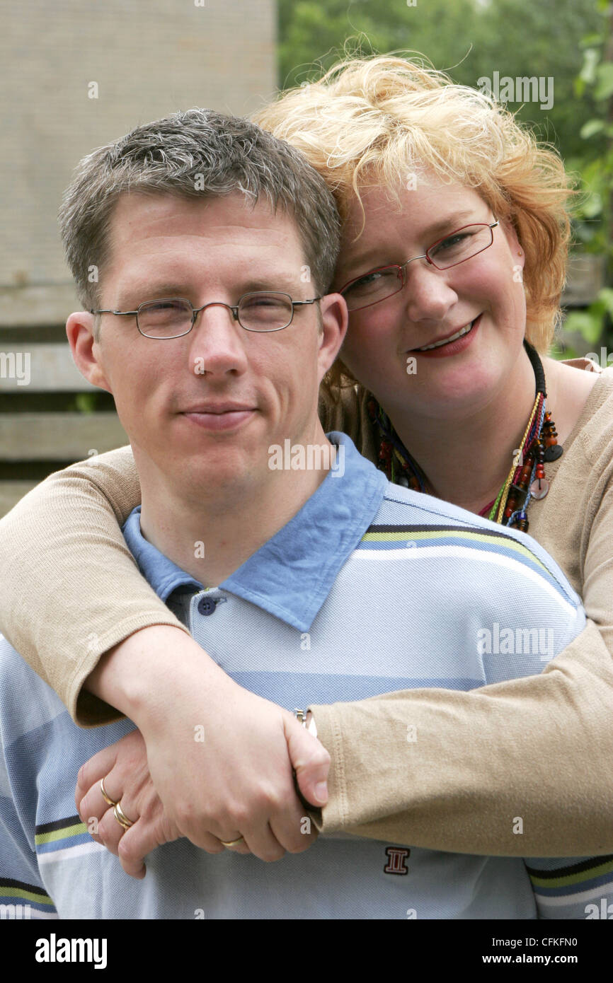 Smiling couple holding one another hi-res stock photography and images ...