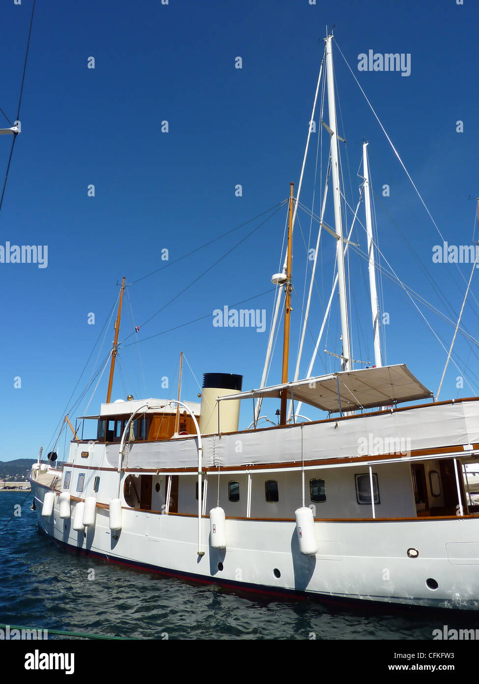 Big white boat with masts floating on the mediterranean sea by ...