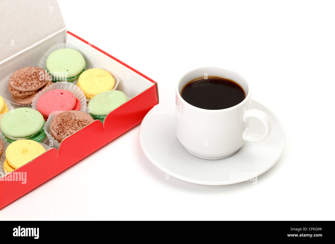 Colorful Macaroon and cup of coffee on white background Stock Photo - Alamy