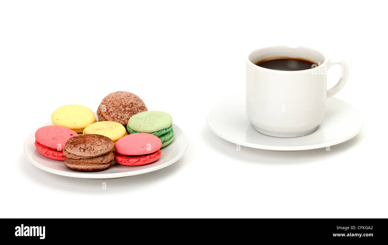 Colorful Macaroon and cup of coffee on white background Stock Photo - Alamy