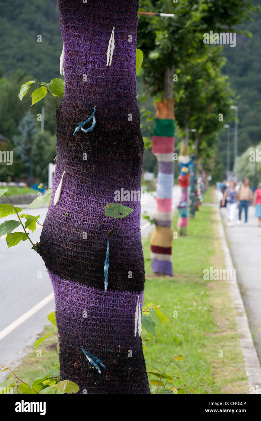 Trees wrapped in colourful decorative wool in Eidjford, Norway Stock ...