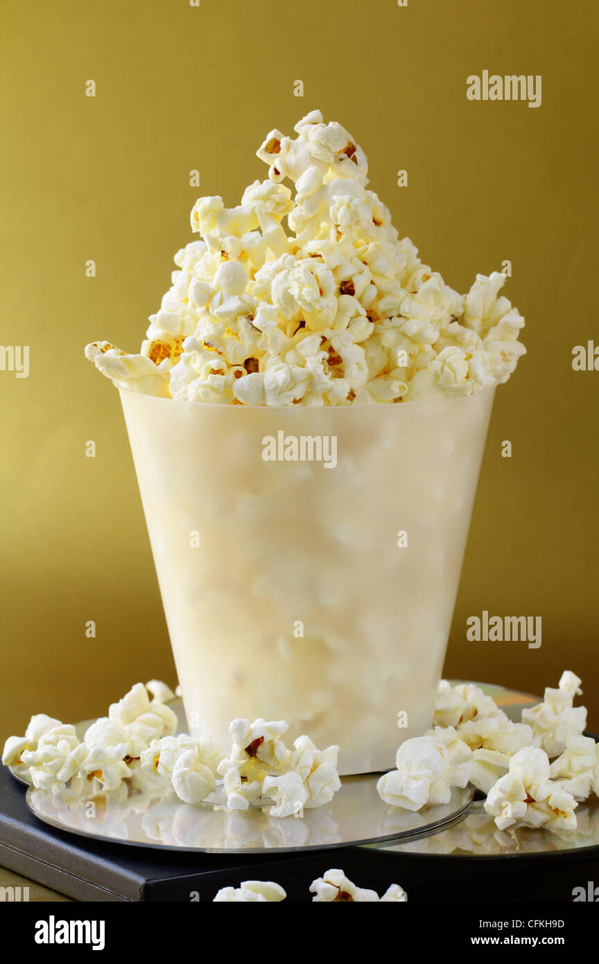 cup of popcorn and DVD disks Stock Photo - Alamy