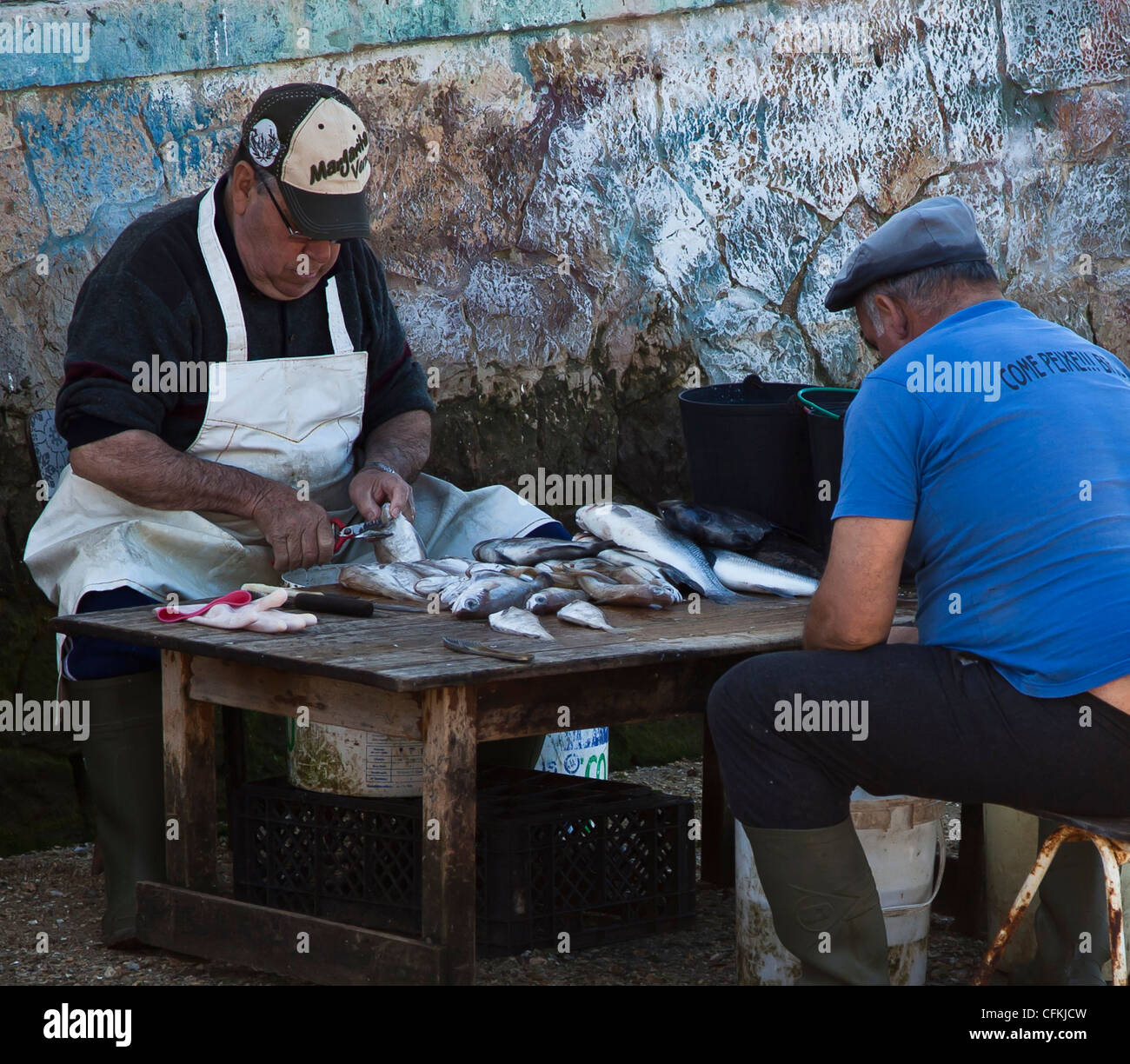 Man gutting a fish hi-res stock photography and images - Alamy