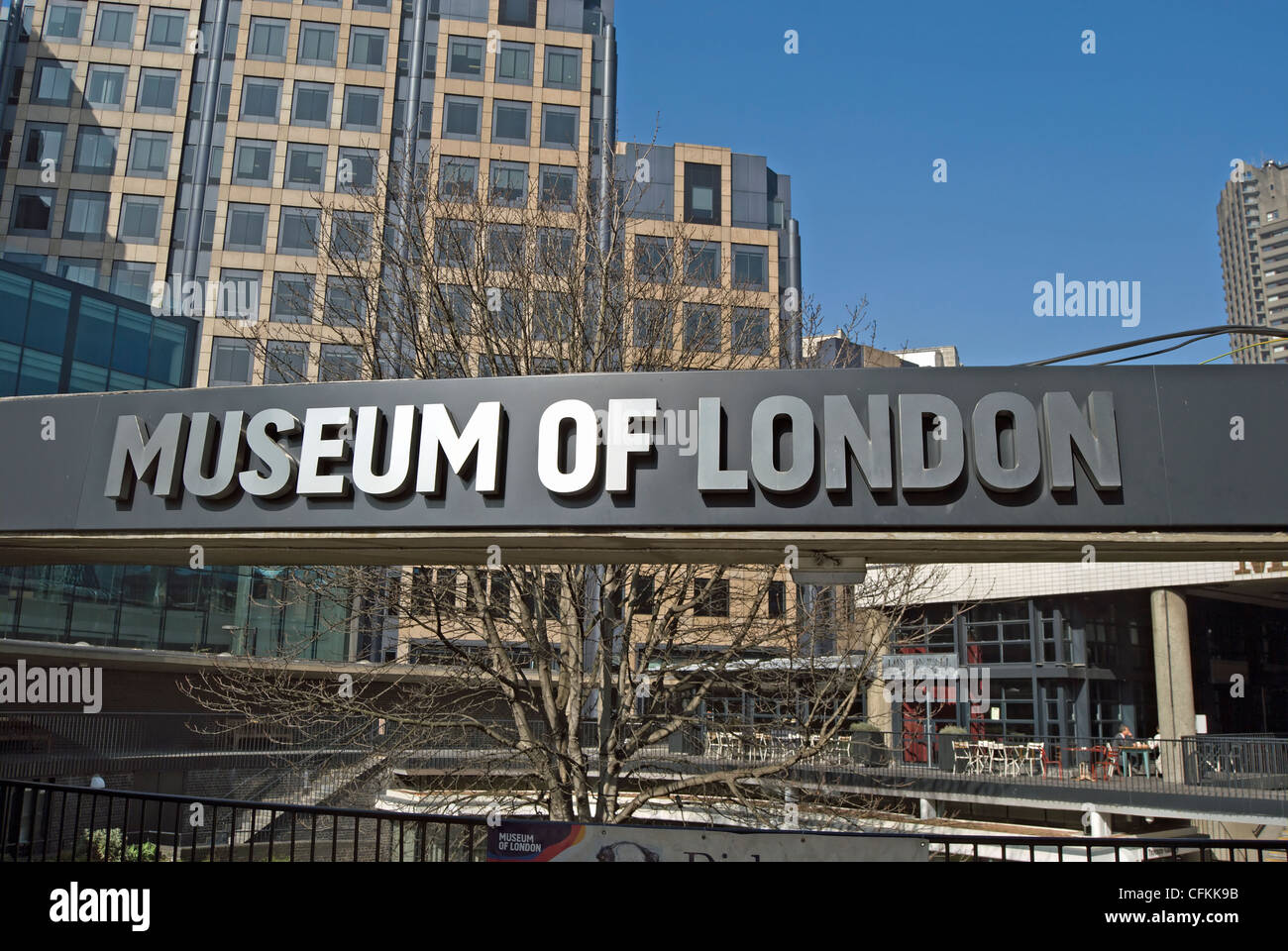 exterior of the museum of london, england, with high rise buildings of ...