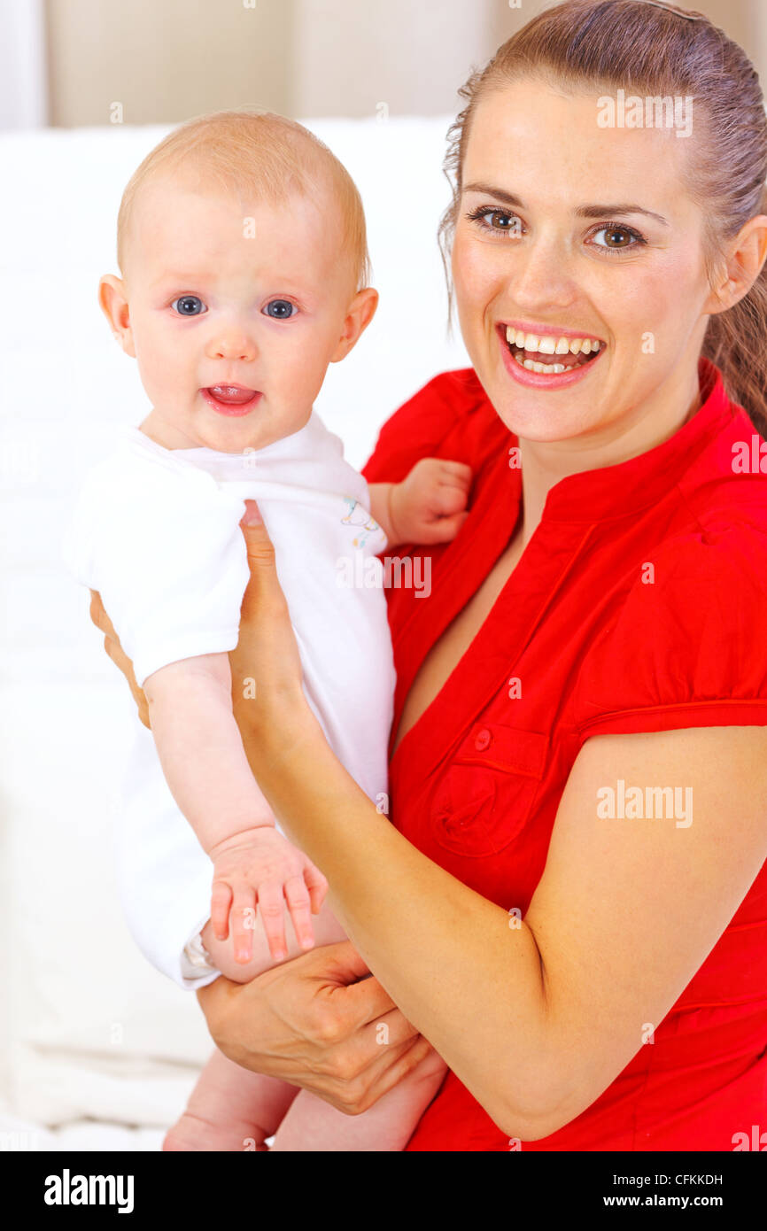 Portrait of happy baby and smiling mommy Stock Photo - Alamy