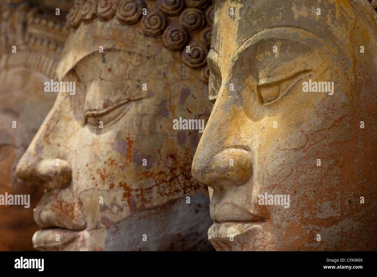 Peaceful Asian Statue Faces Stock Photo - Alamy