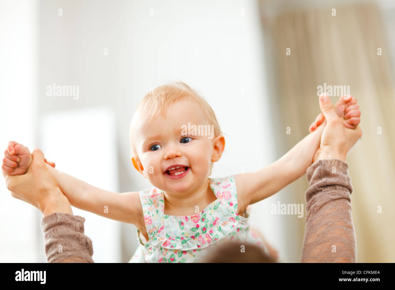 Portrait of happy playing baby at home Stock Photo - Alamy