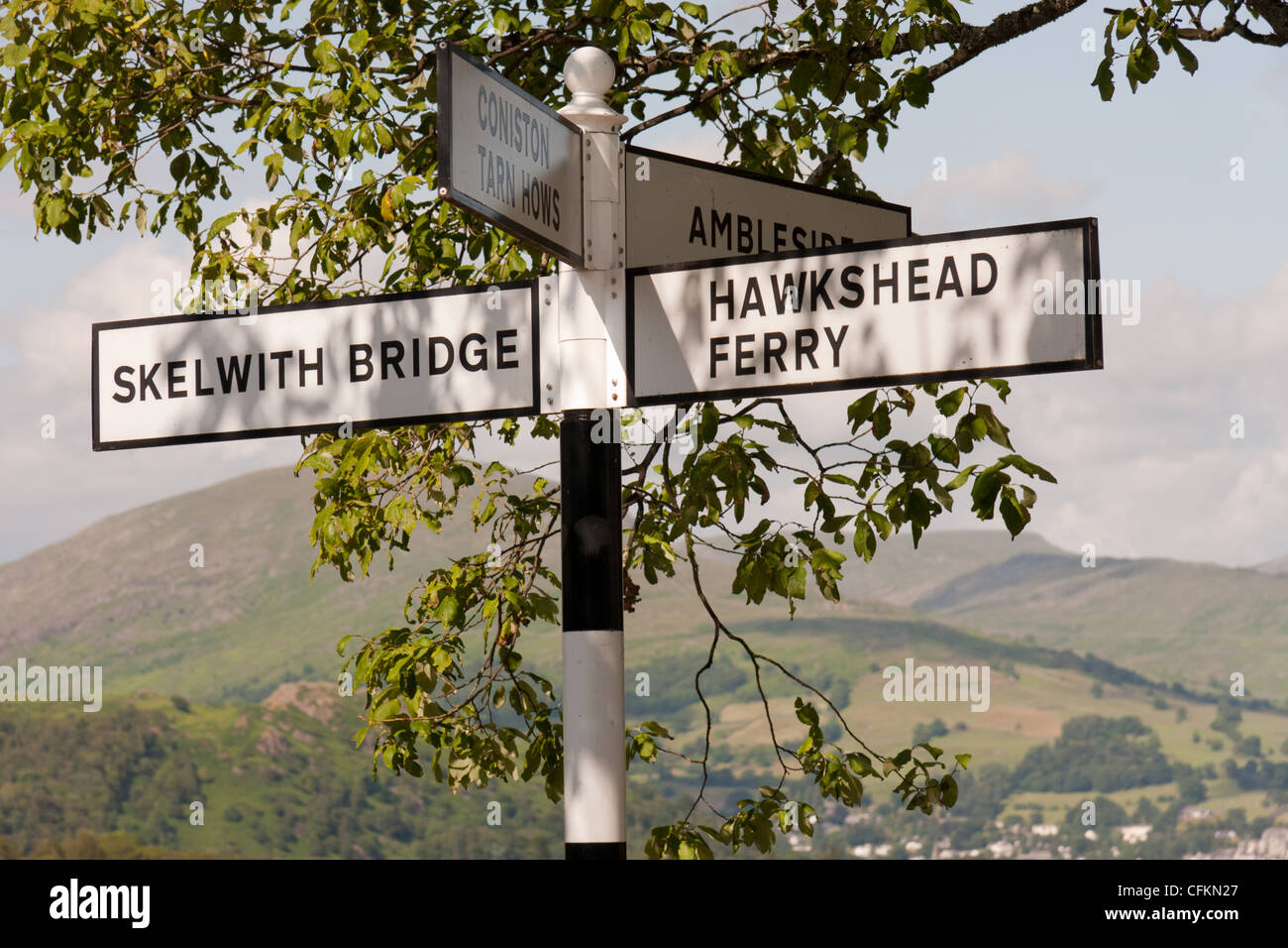 Old fashioned road sign in the Lake District near Ambleside Stock Photo ...