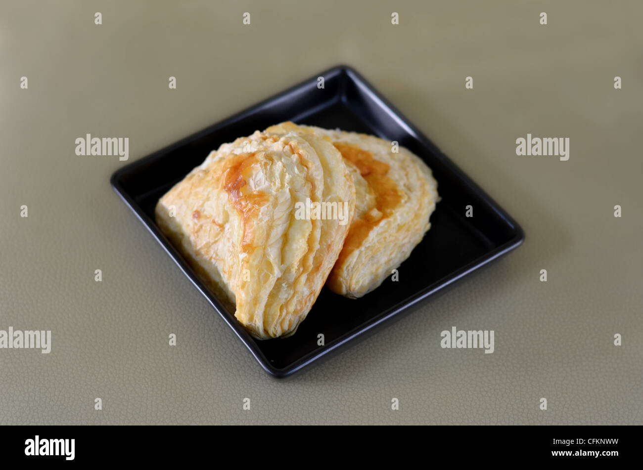 Puff pastry with tuna on the plate Stock Photo - Alamy