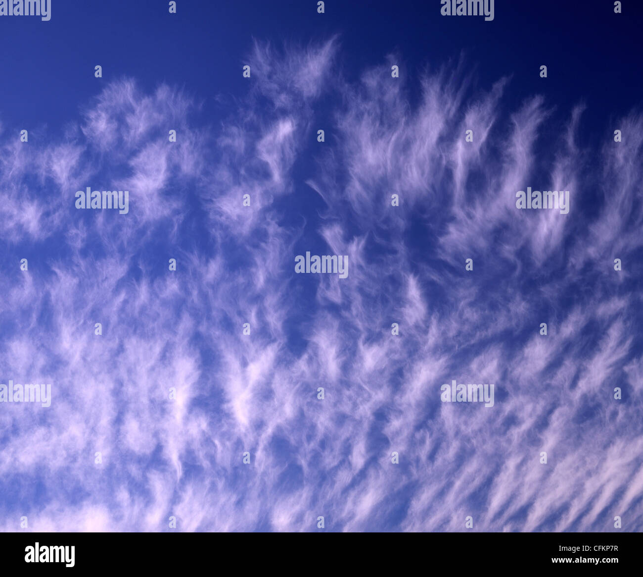 Cirrus clouds, Mare's Tail pattern Stock Photo - Alamy