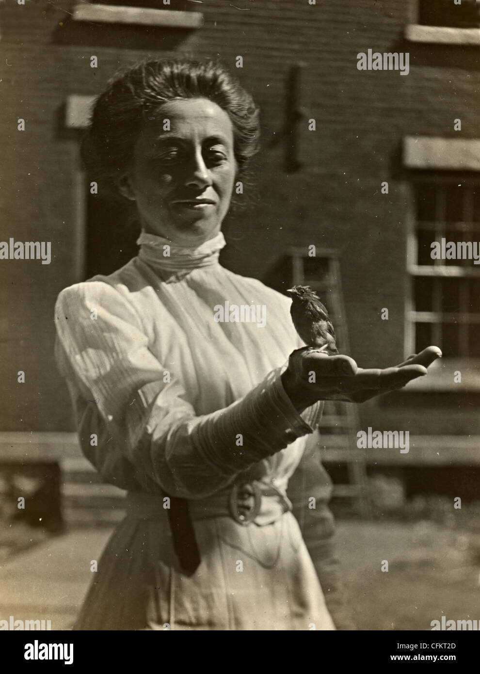 Woman with a Tame Wild Bird Stock Photo - Alamy