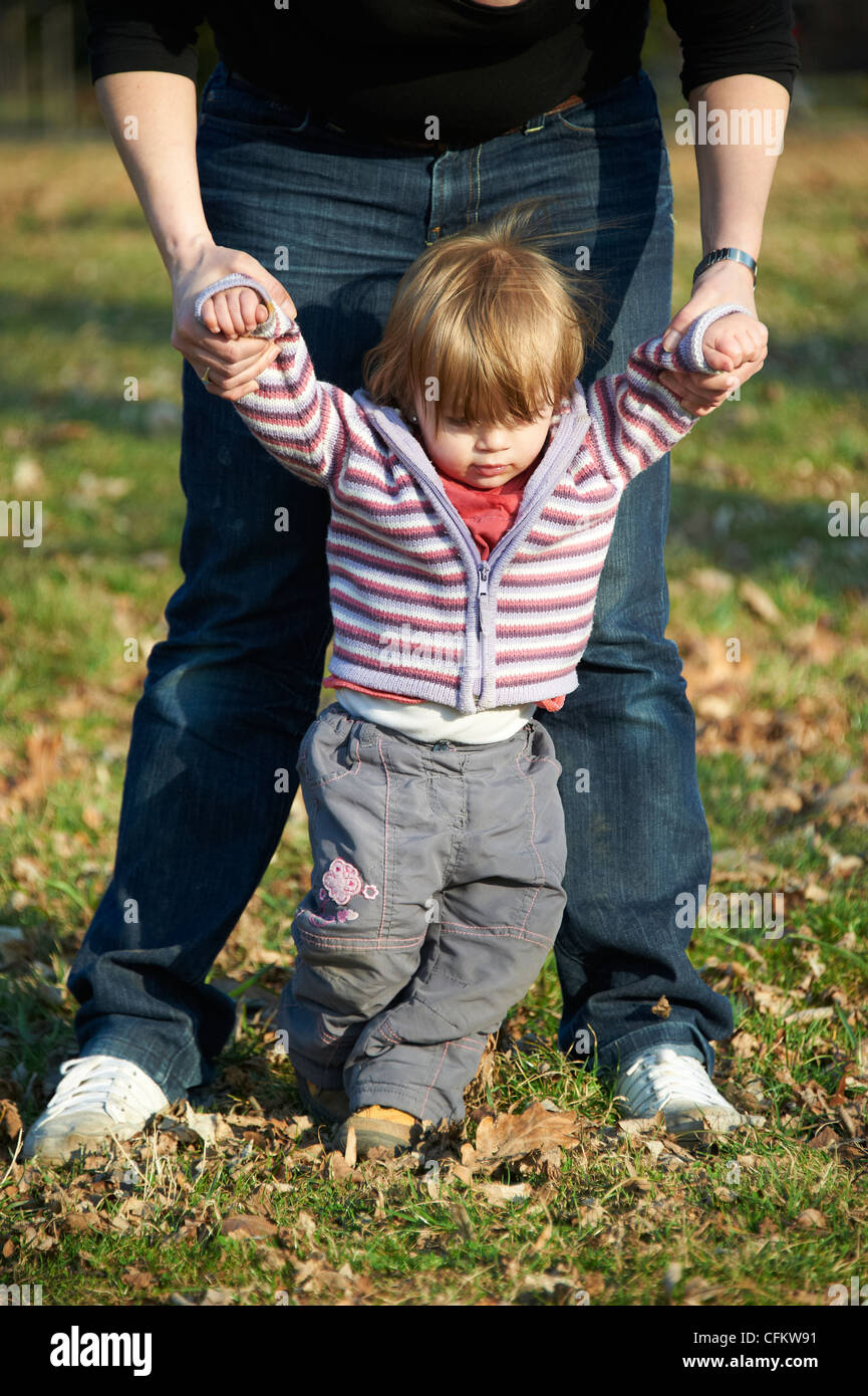 Baby toddling learning walk hi-res stock photography and images - Alamy