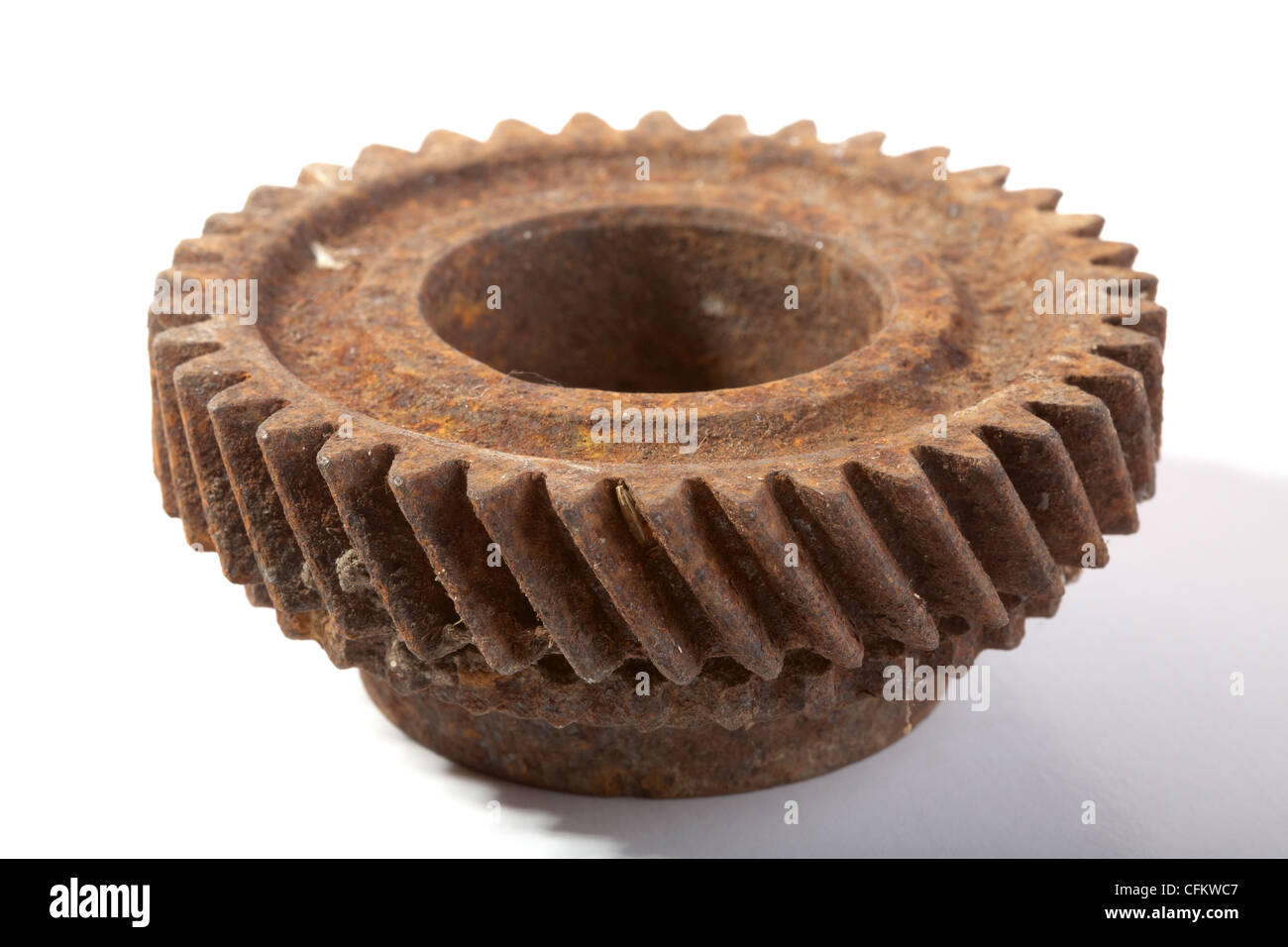 Rusty gears on a white background isolated Stock Photo - Alamy