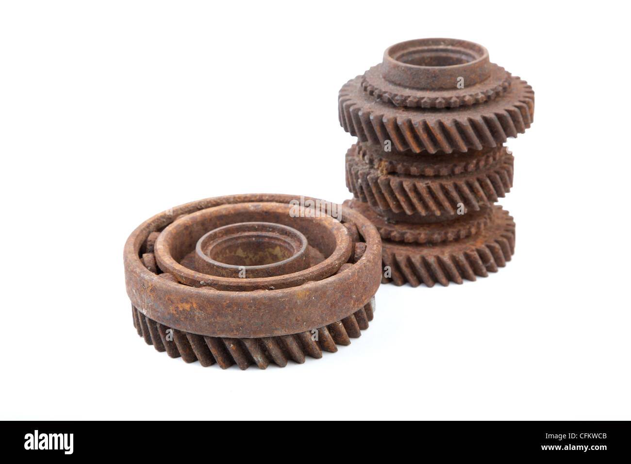 Rusty gears on a white background isolated Stock Photo - Alamy