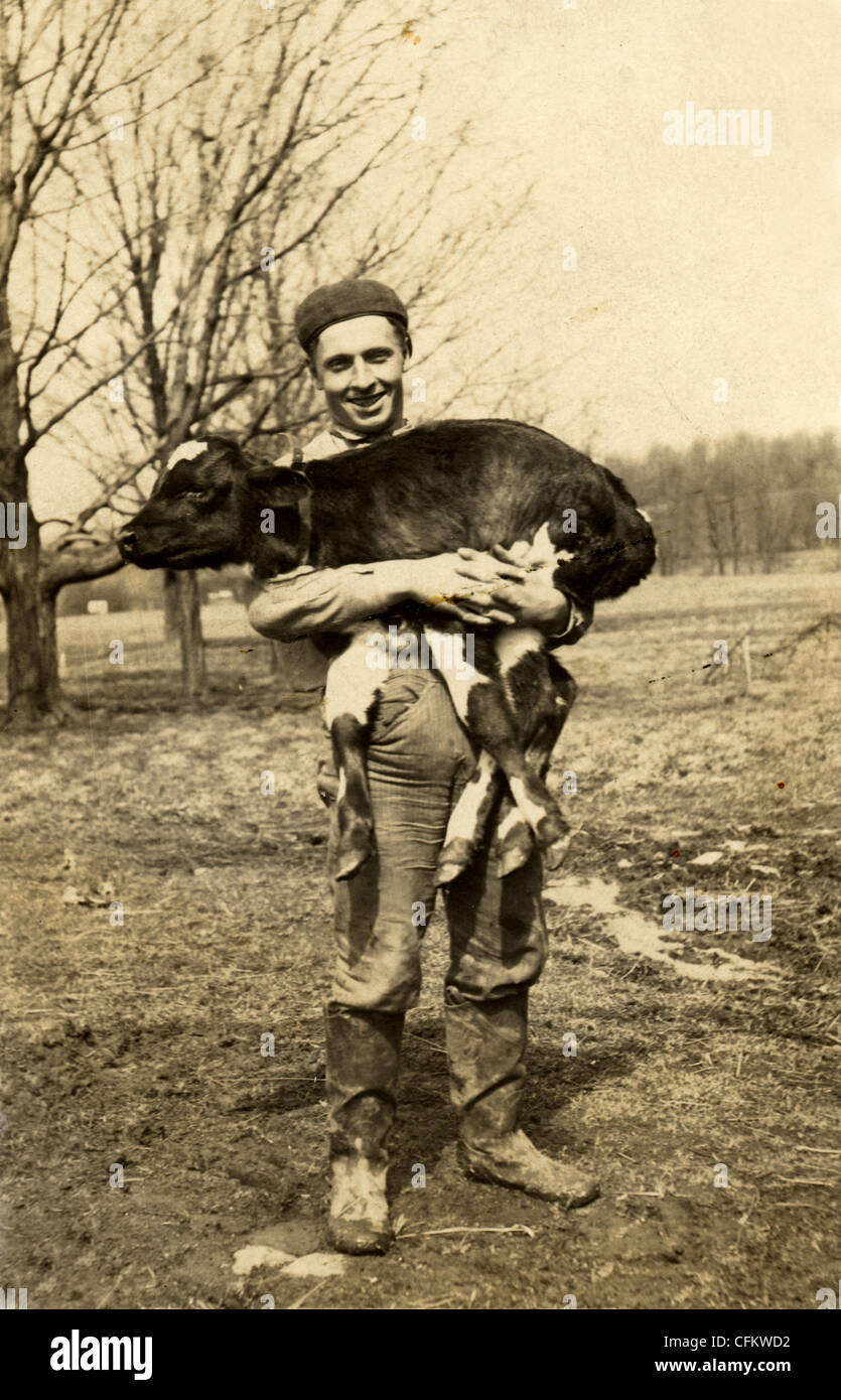 Man carrying cow hi-res stock photography and images - Alamy