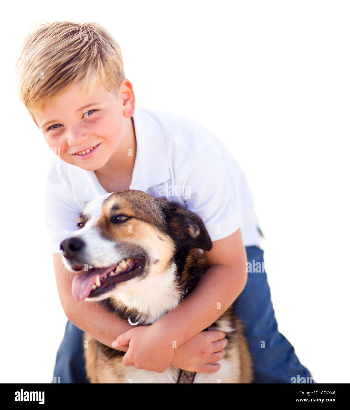 Handsome Young Boy Playing with His Dog Isolated on a White Background ...