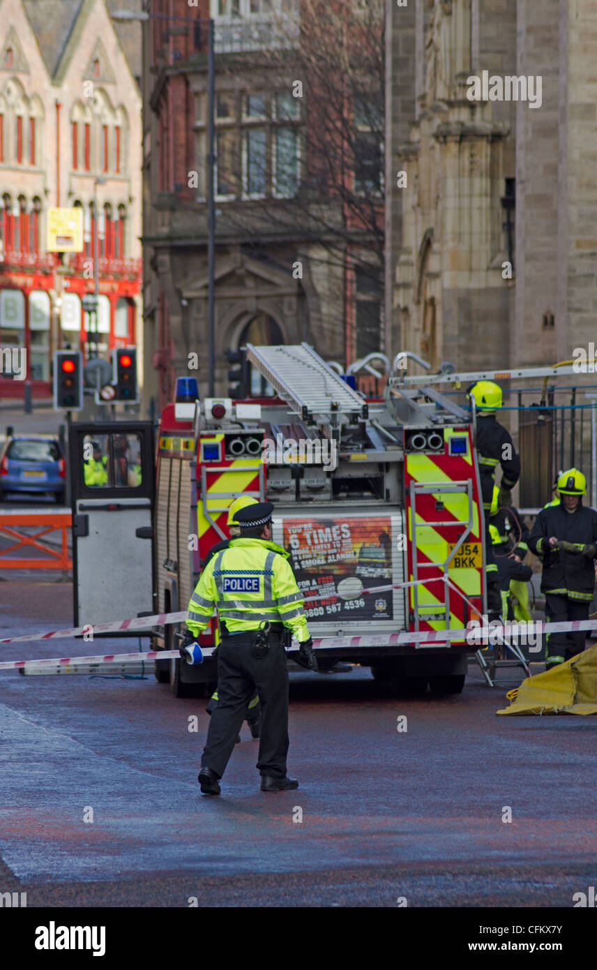 Police officer and firefighters at a disaster training exercise in ...