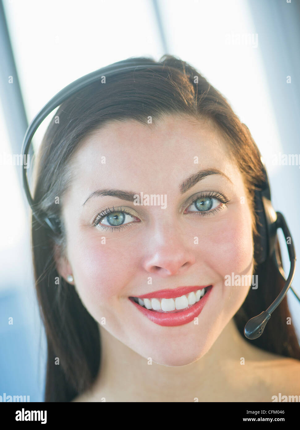 Portrait of female customer service representative Stock Photo - Alamy