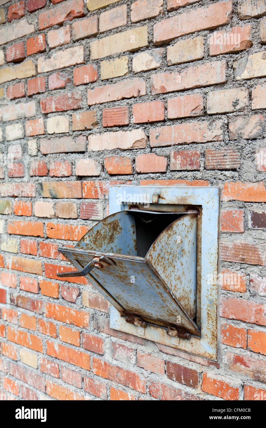 A chute in the side of the gas chamber at Dachau Concentration Camp for ...
