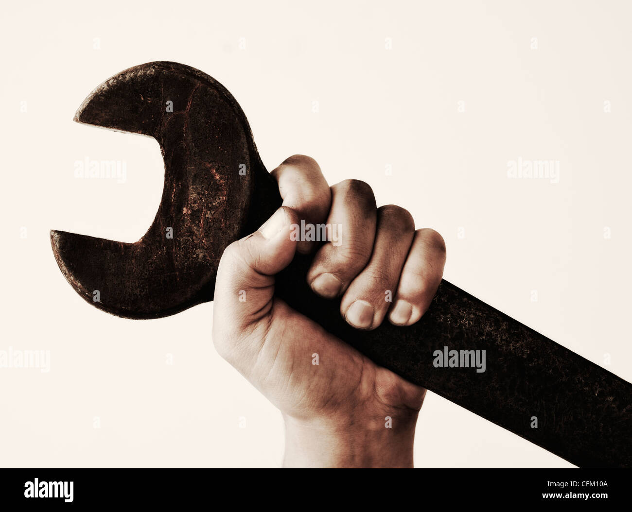 Hand holding wrench hi-res stock photography and images - Alamy
