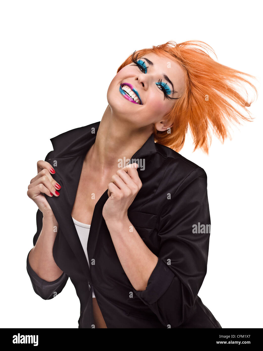 Young woman dancing and smiling Stock Photo - Alamy