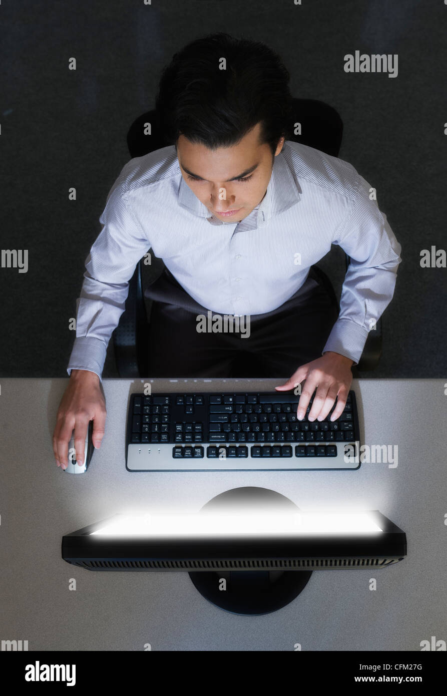 Man working with computer, studio shot Stock Photo - Alamy