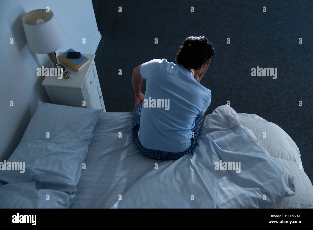 Man sitting up in bed hi-res stock photography and images - Alamy