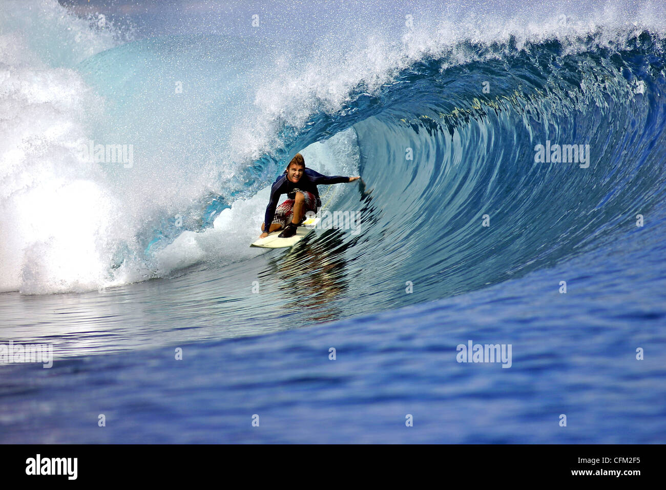 Surfing deep in the barrel on a wave. Panaitan Island, Ujung Kulon ...