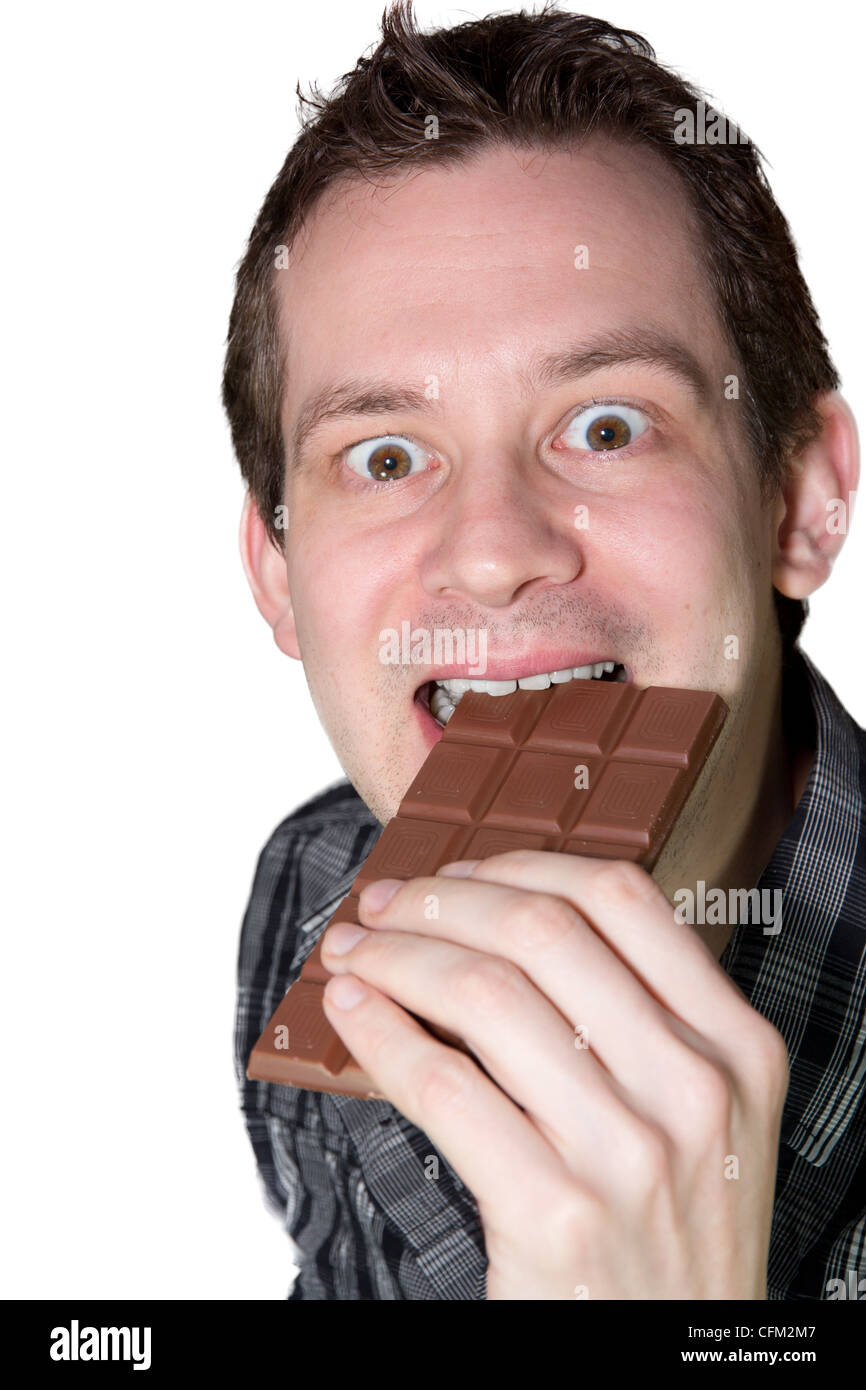 Eating a chocolate bar man hi-res stock photography and images - Alamy