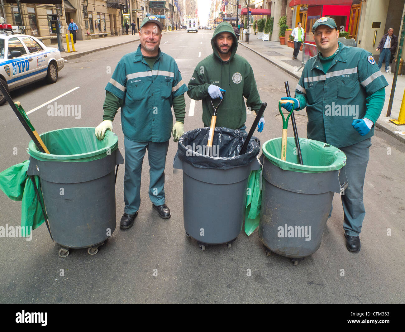 Sanitation workers cleaning up after the Tartan Day Parade in midtown ...