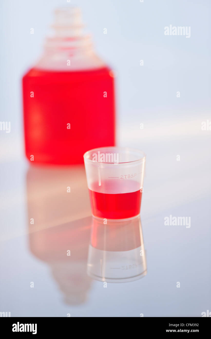Studio shot of red medicine Stock Photo - Alamy