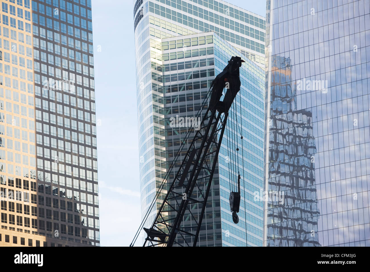 Usa, New York State, New York City, crane's hook in front of skyscraper ...