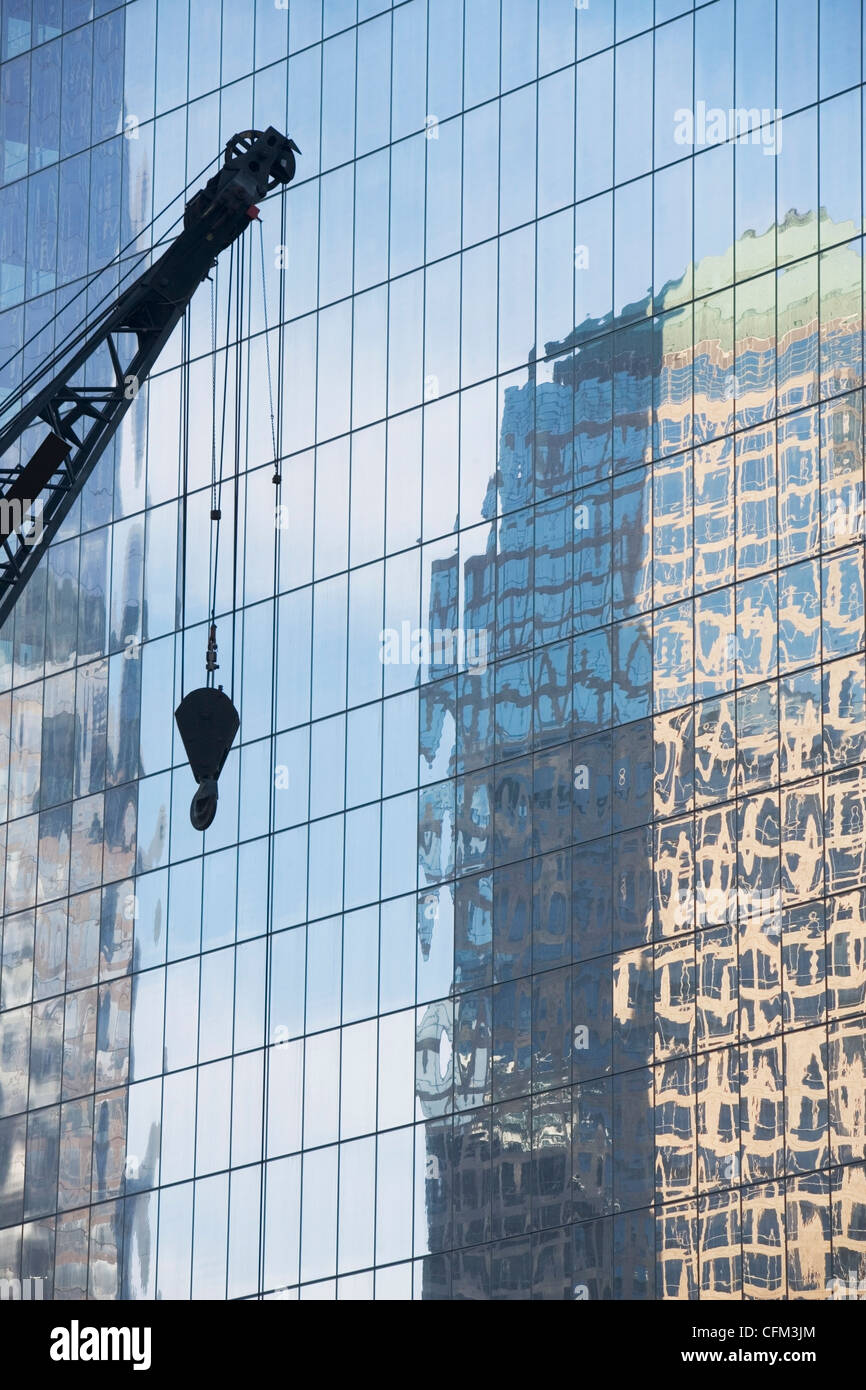 Usa, New York State, New York City, crane's hook and glass` reflection ...