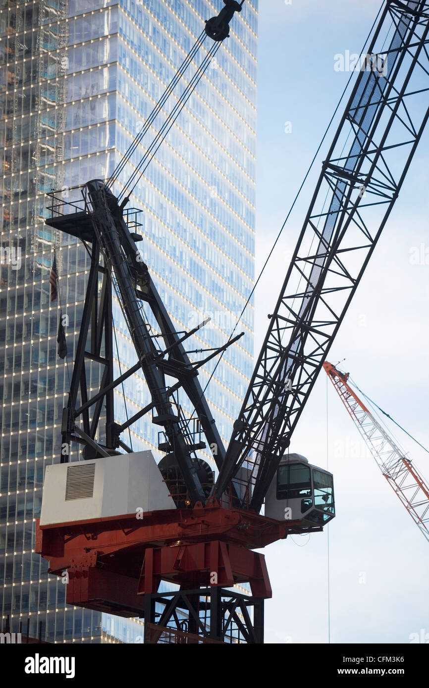 Usa, New York State, New York City, crane in front of skyscraper Stock ...
