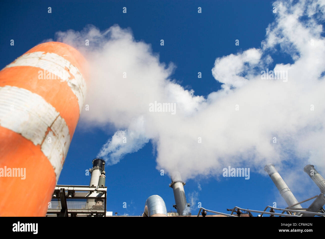 USA, New York State, New York City, low angle view of factory chimneys ...