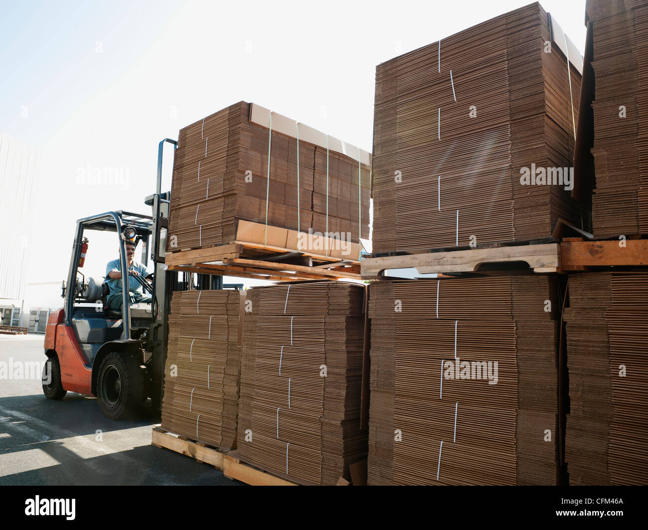 USA, California, Santa Ana, Forklift truck moving pallets Stock Photo ...