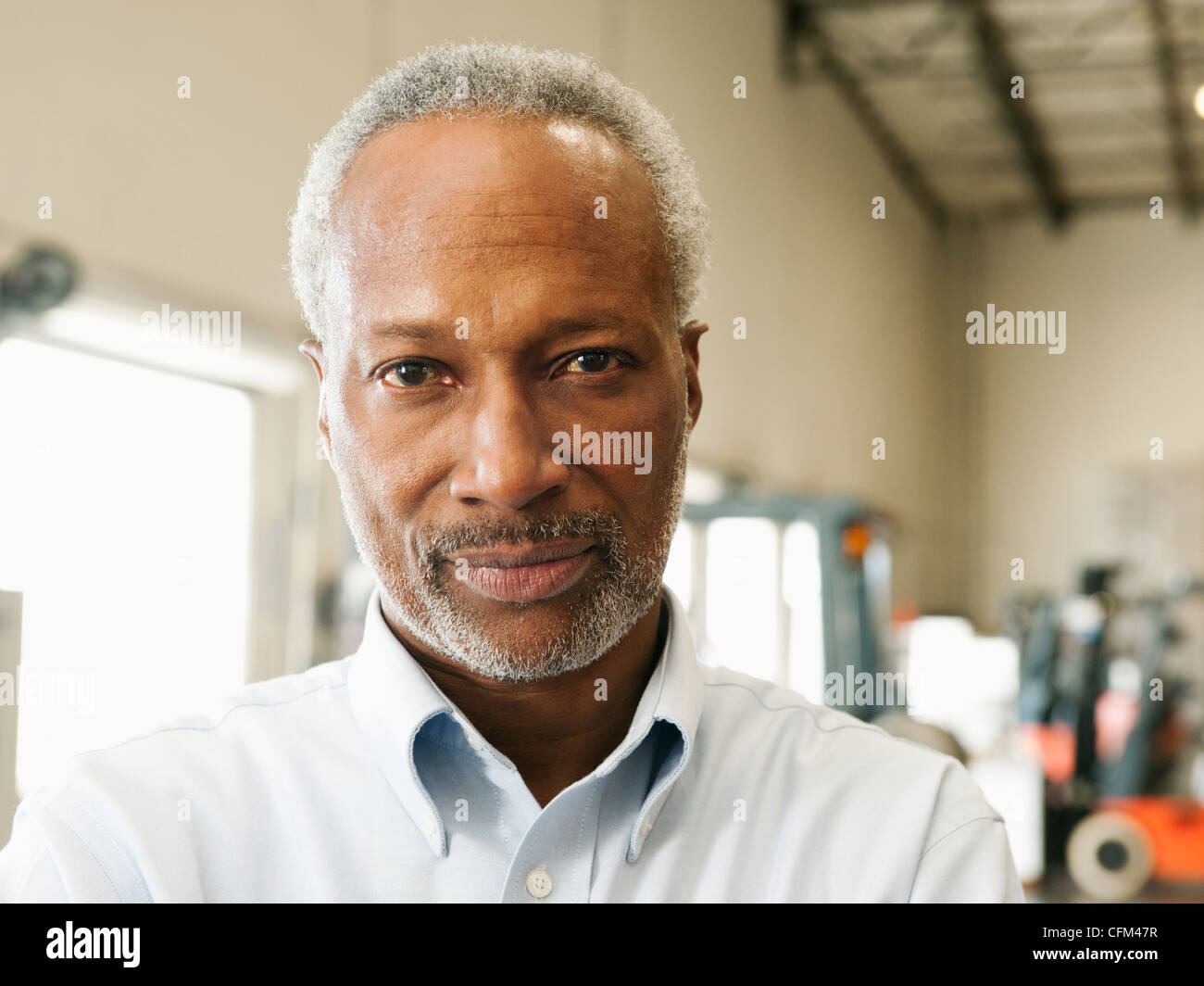 USA, California, Santa Ana, Portrait of businessman in warehouse Stock ...