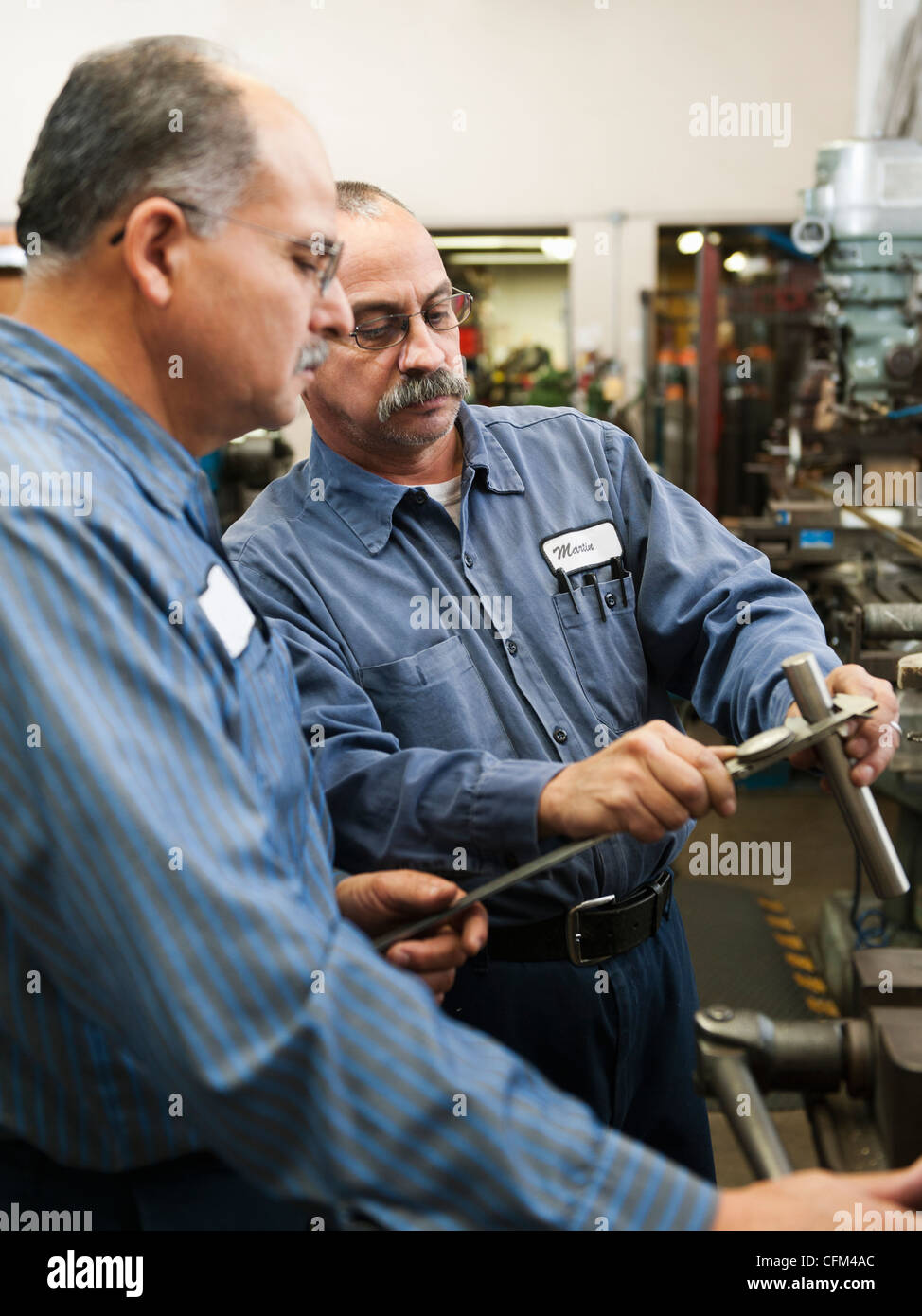 Skilled factory workers hi-res stock photography and images - Alamy