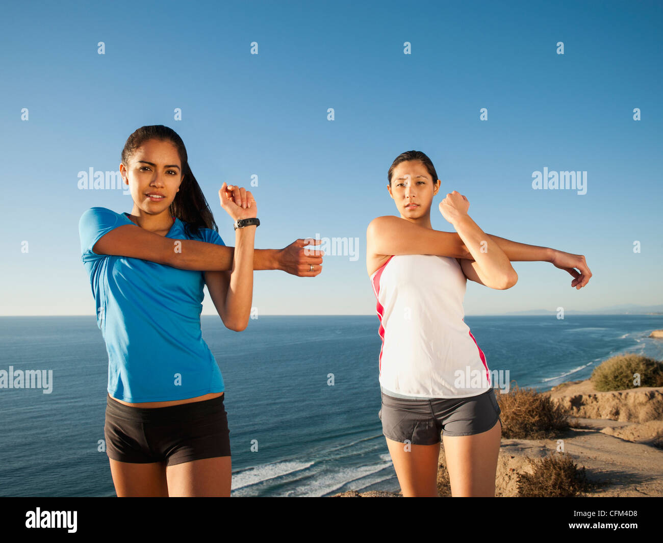 Two women exercise beach hi-res stock photography and images - Alamy