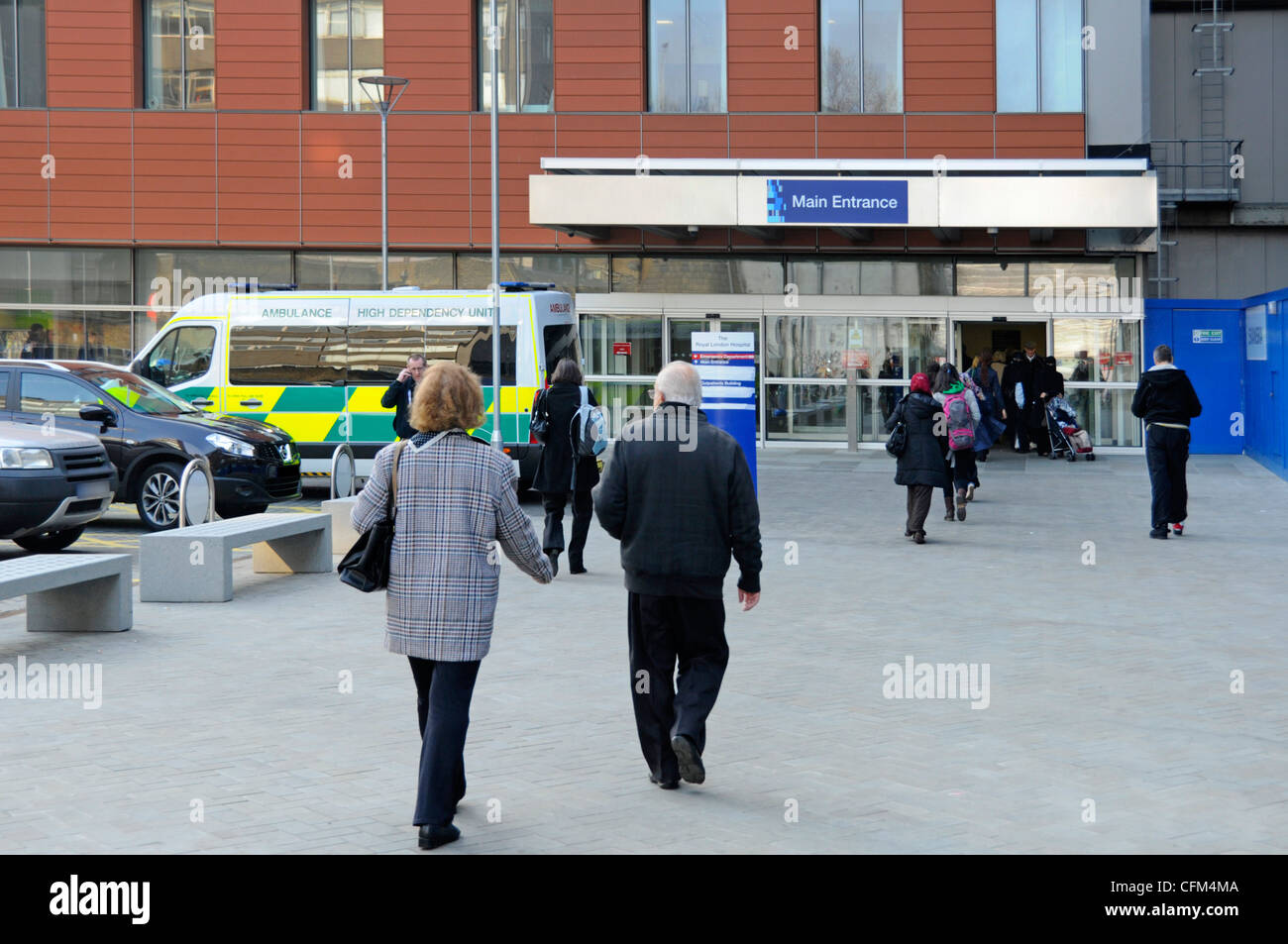 People walk towards Main Entrance at The Royal London Hospital which ...
