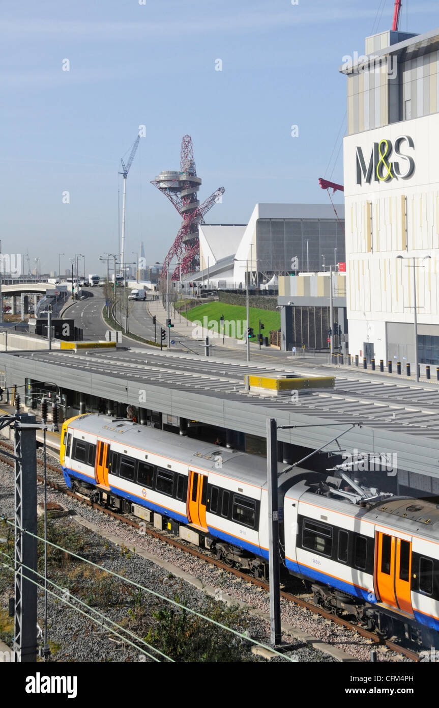 London Overground train Stratford London railway station & M&S sign ...