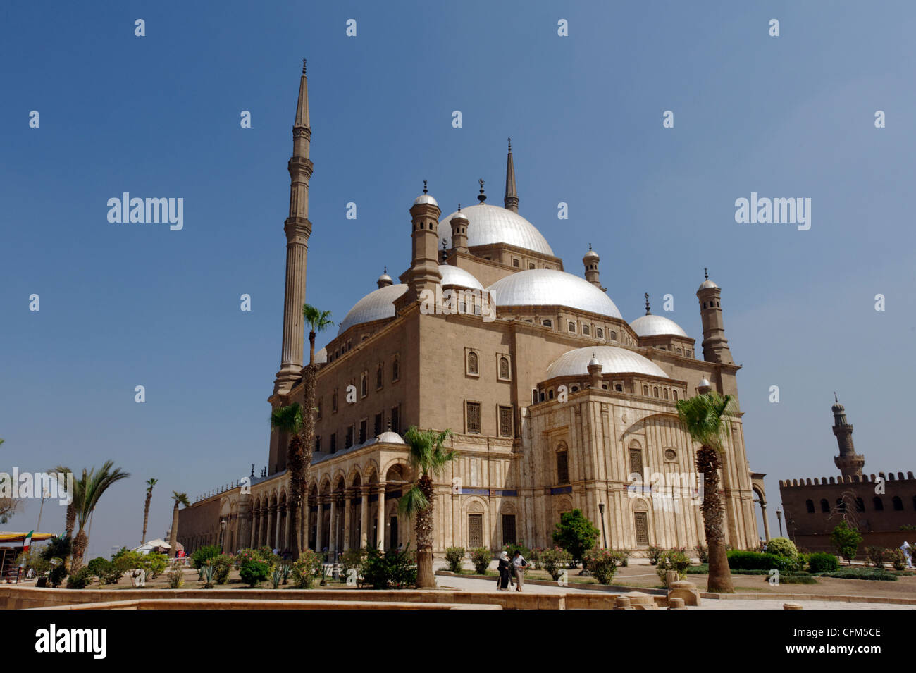 Cairo. Egypt. View of two towering minarets and multiple half-domes ...