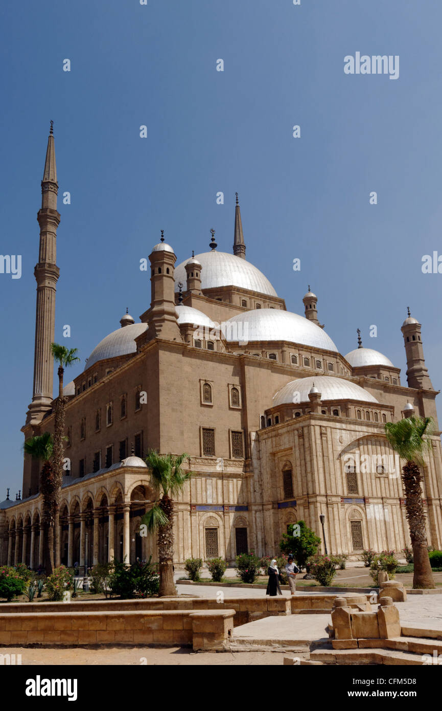 Cairo. Egypt. View of two towering minarets and multiple half-domes ...