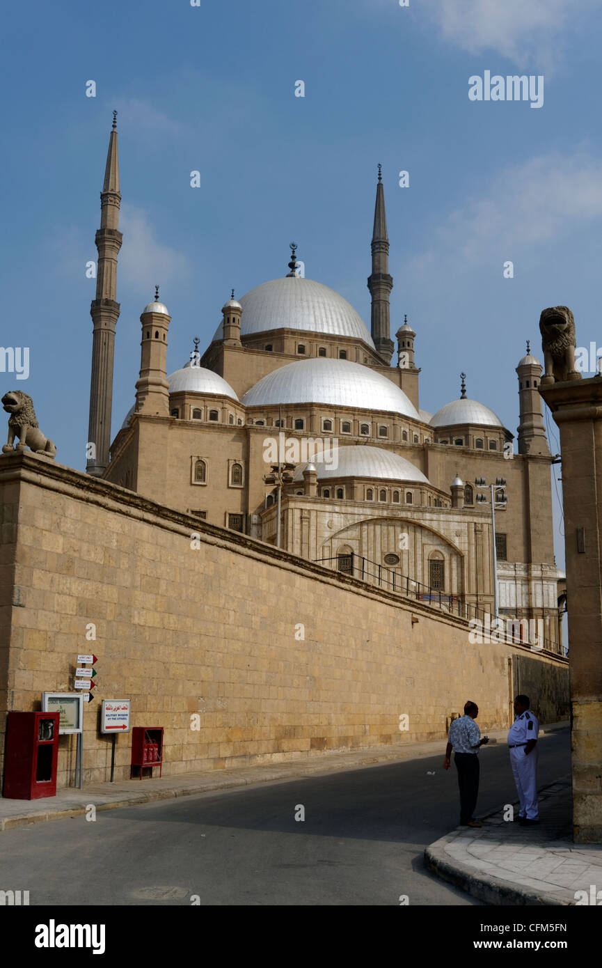 Cairo. Egypt. View of two towering minarets and multiple half-domes ...
