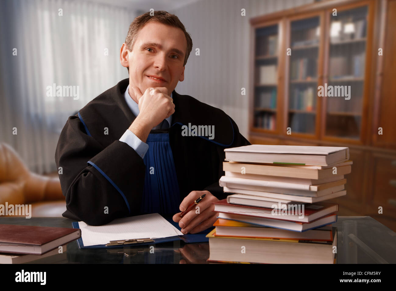 Attorney wearing classic gown in his office Stock Photo - Alamy