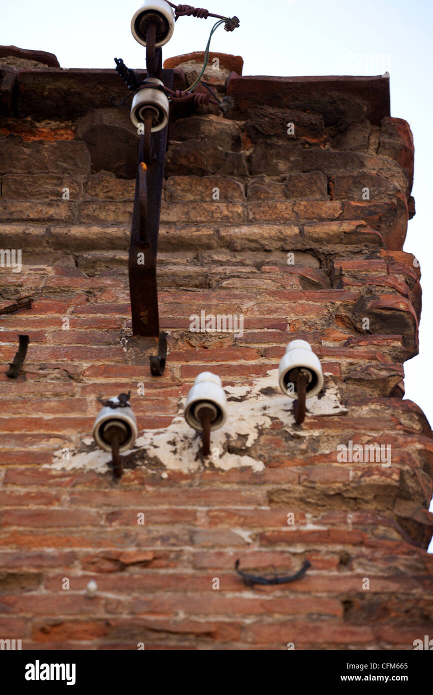 Old fashion electric power insulators Stock Photo - Alamy