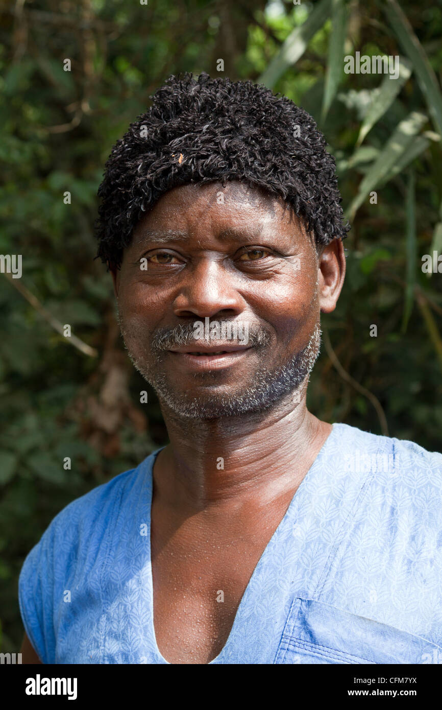 A man with a fur cap in the forest near Dukoue,Ivory Coast ,Cote d ...