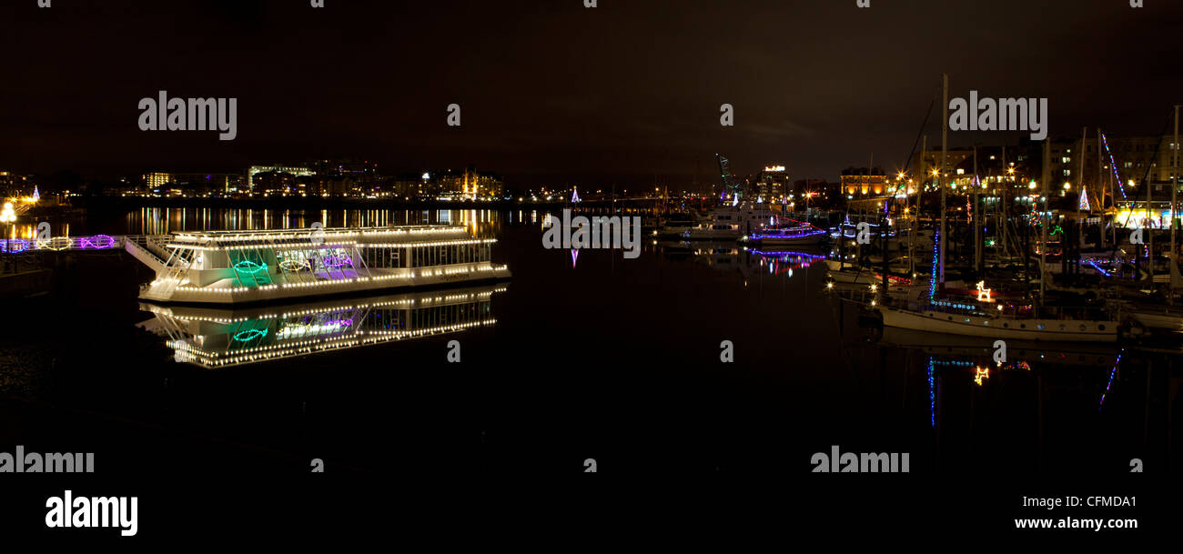 Victoria, British Columbia's Inner harbor, lit up over the Christmas ...